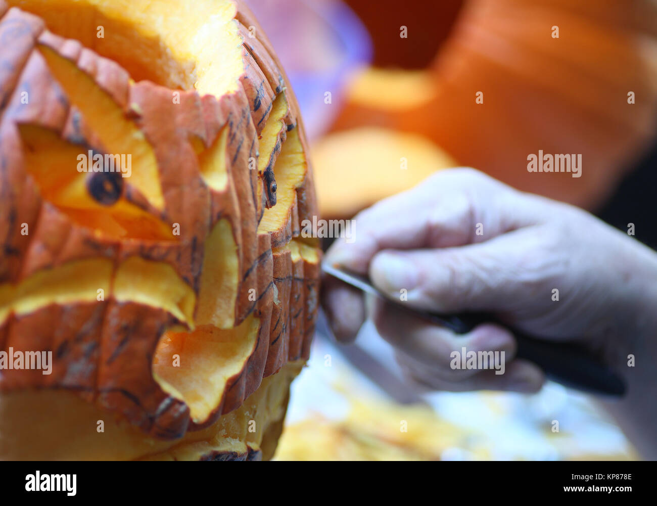 Carving a complex jack o' lantern Stock Photo - Alamy