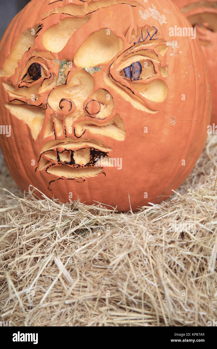 Unique Halloween pumpkin with straw Stock Photo - Alamy