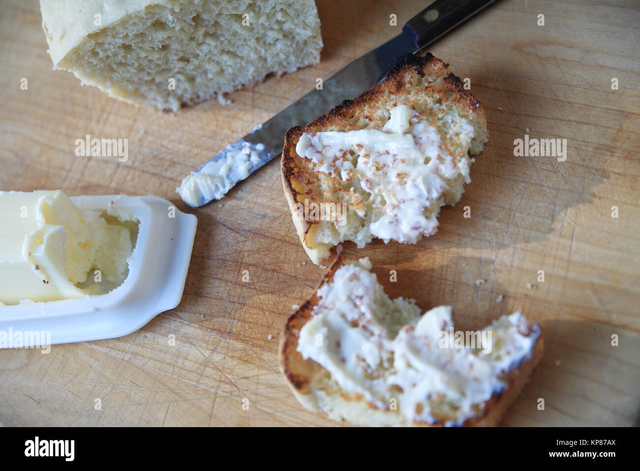 Buttered toast with morning light Stock Photo - Alamy
