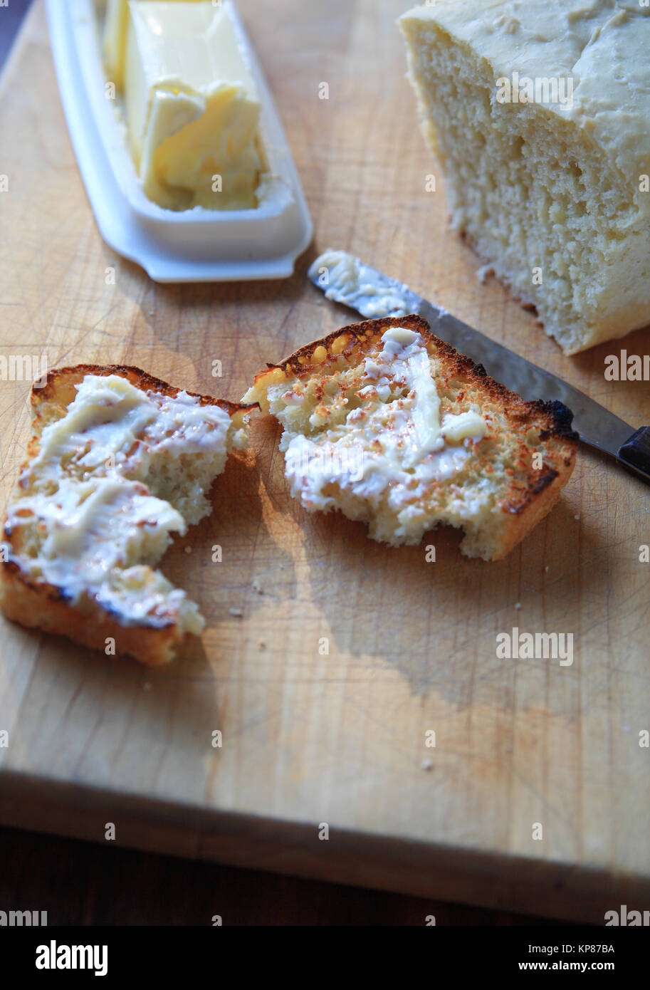 Buttered toast for a quick breakfast Stock Photo - Alamy
