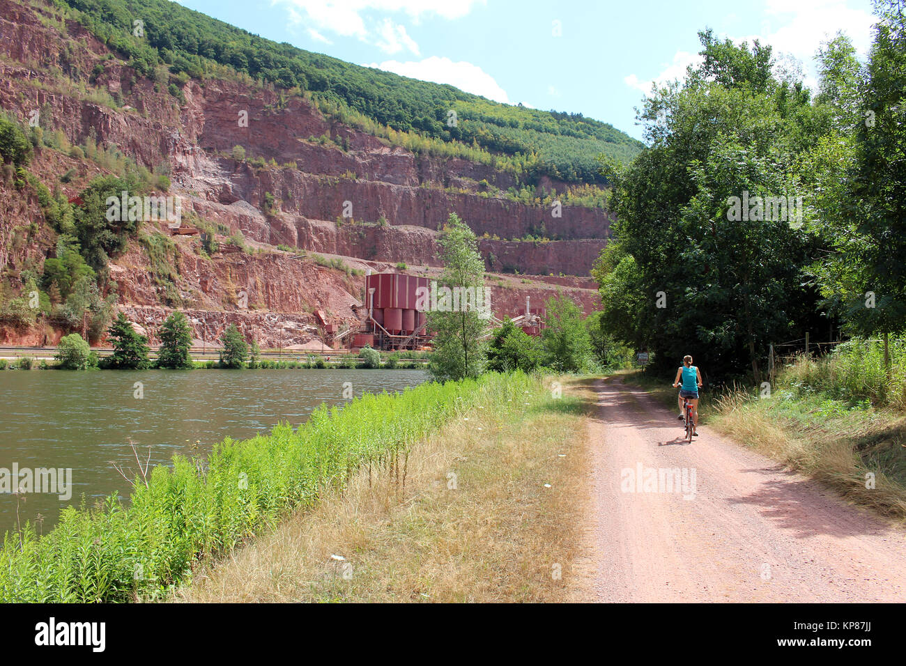 Cyclists: Iron mining on the banks of the Saar in summer - Saarland ...