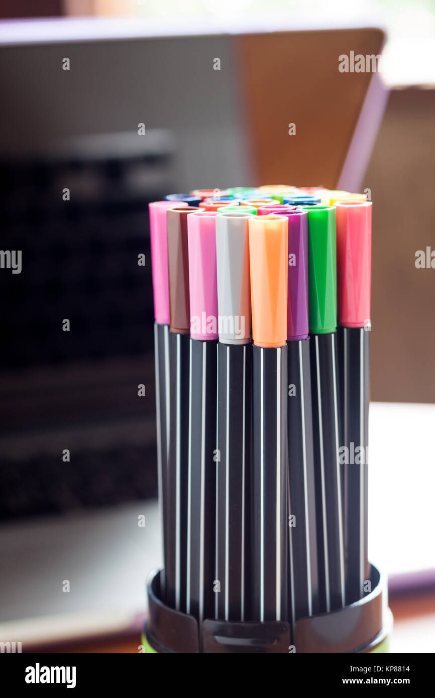 Magic color pens with blurred background Stock Photo - Alamy