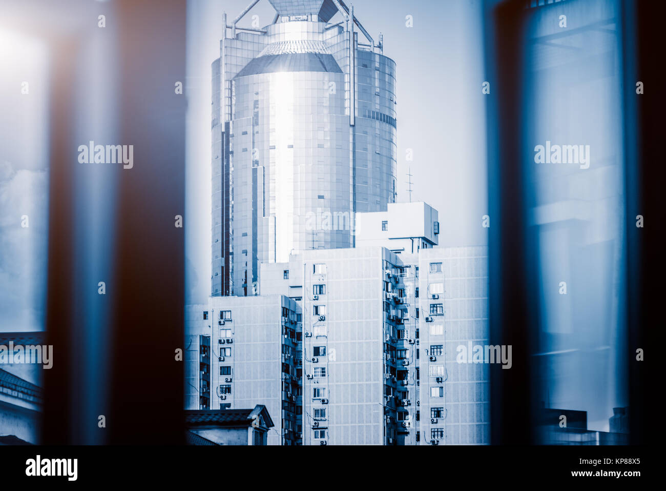 view of Modern skyscraper building through window Stock Photo - Alamy