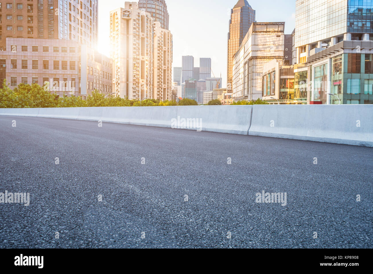 empty asphalt road through modern city in China Stock Photo - Alamy