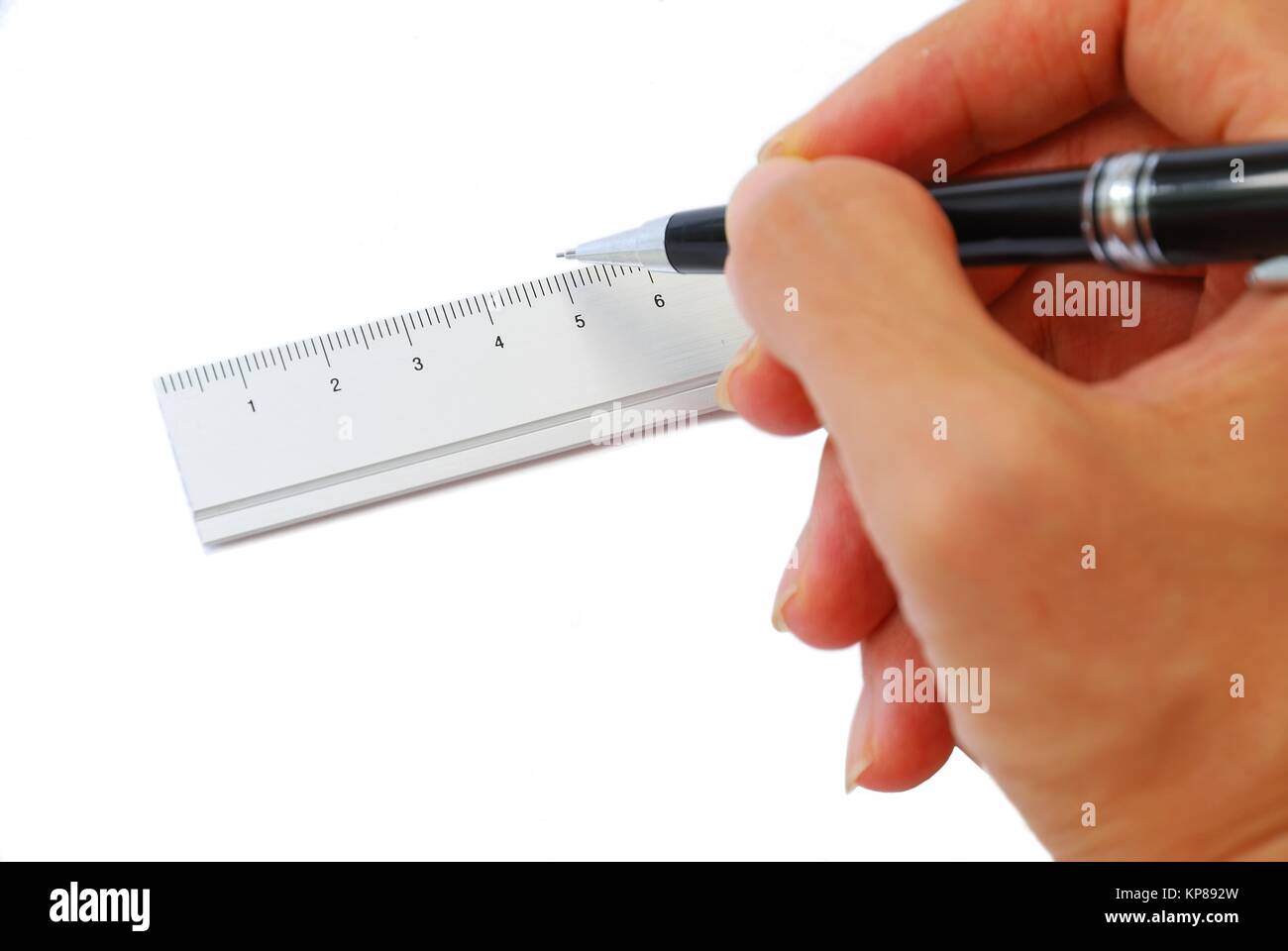 Hand writing with pen and ruler for concepts such as office stationery ...