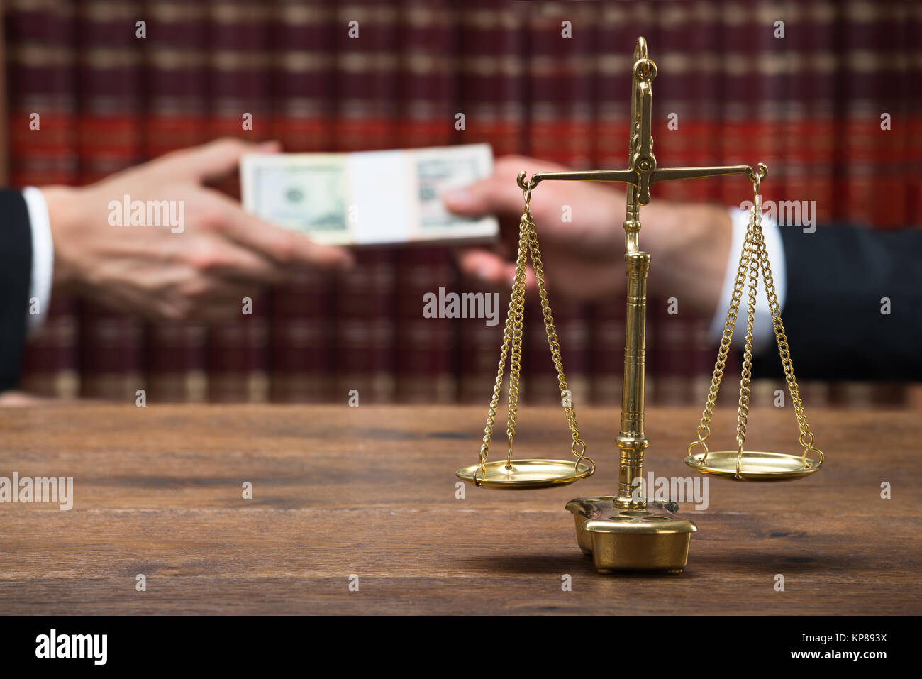 Justice Scale On Table With Judge Taking Bribe From Client Stock Photo ...