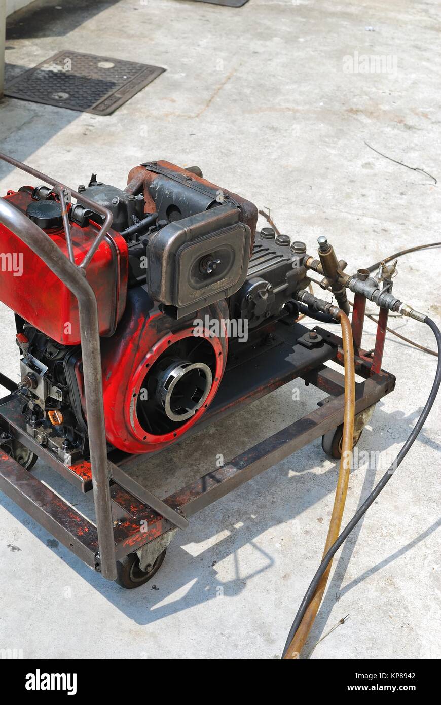 Industrial sewage cleaning equipment with sewage in background. For ...