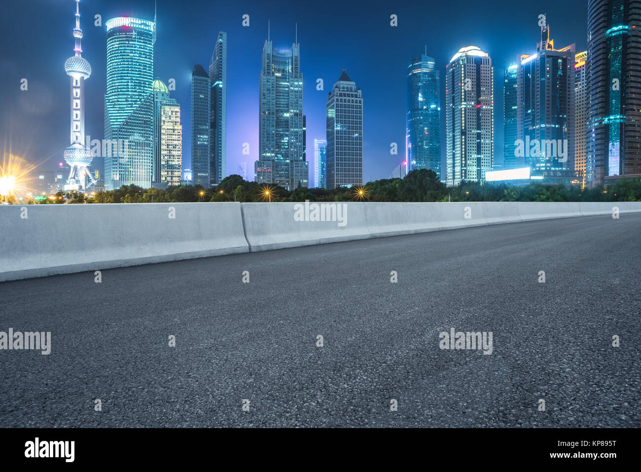 empty asphalt road through modern city in China Stock Photo - Alamy