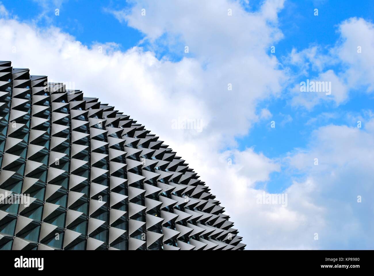 Unique, modern architecture of a concert hall against blue sky ...