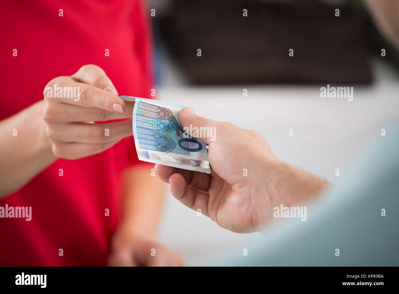 Cropped Image Of Saleswoman Receiving Payment From Customer Stock Photo ...
