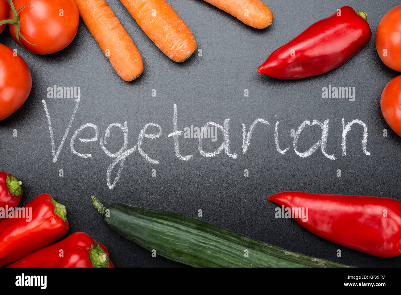 Vegetarian Written Amidst Fresh Vegetables On Blackboard Stock Photo ...