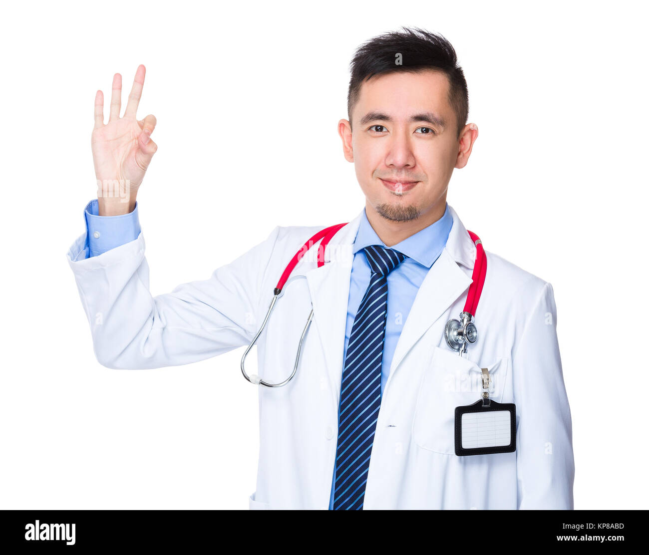 Male doctor showing ok sign gesture Stock Photo - Alamy