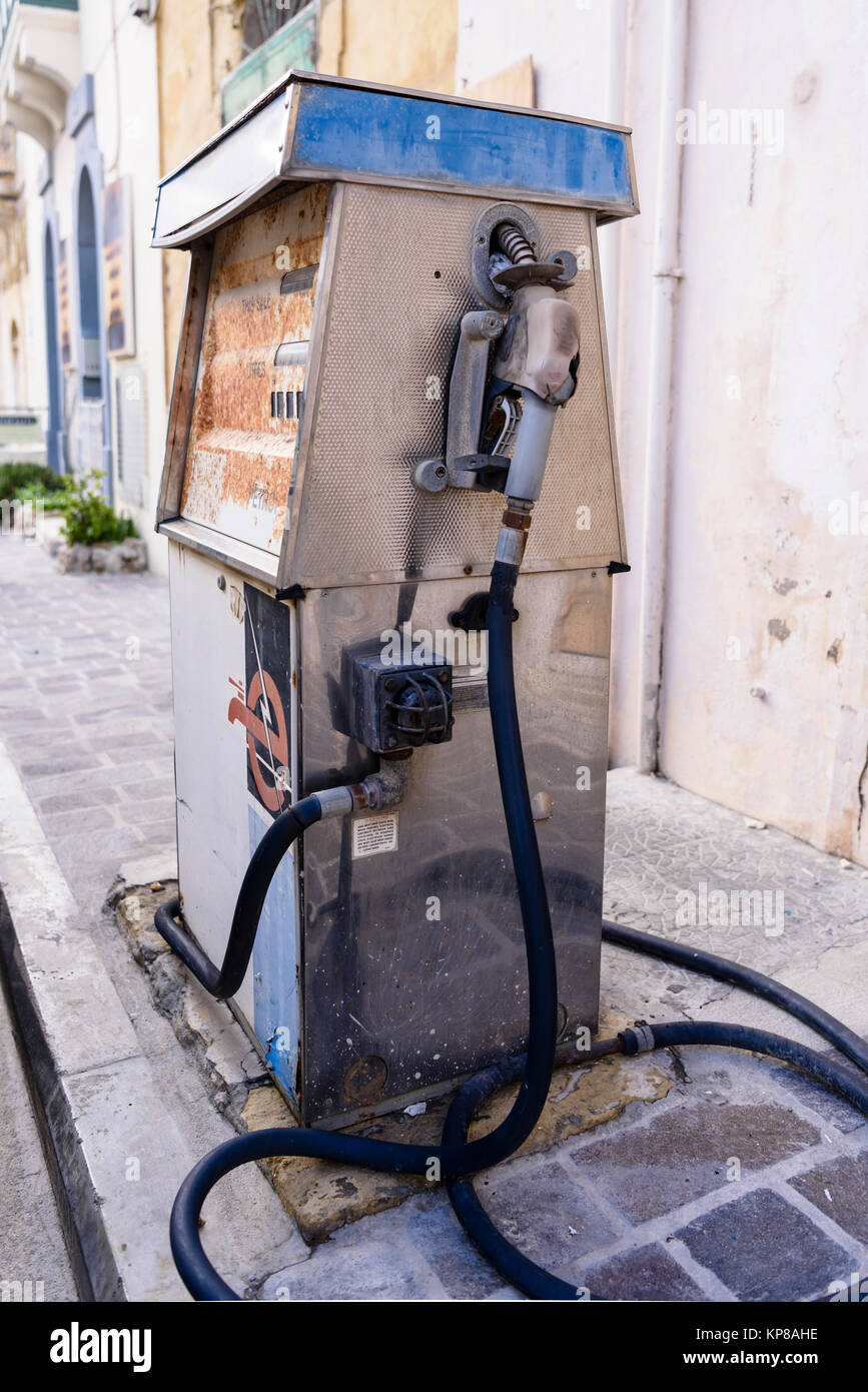 Old, rusty petrol pump at a roadside petrol station Stock Photo - Alamy