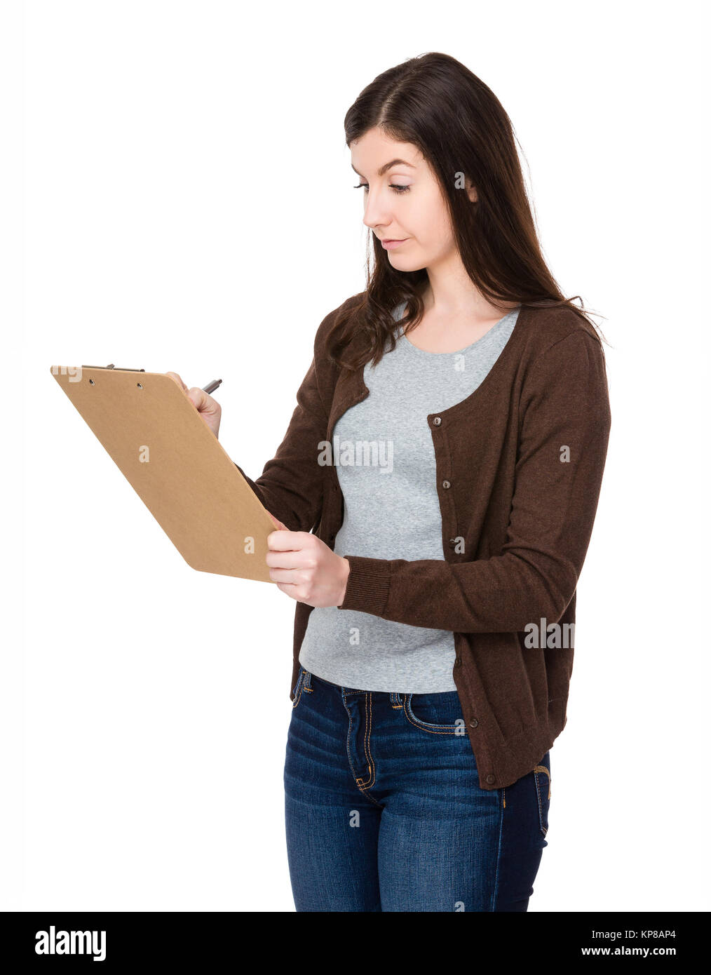 Woman take note on clipboard Stock Photo - Alamy
