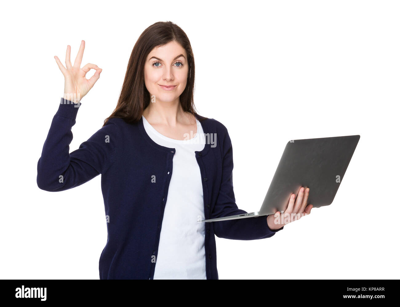 Woman hold with laptop computer and ok sign gesture Stock Photo - Alamy