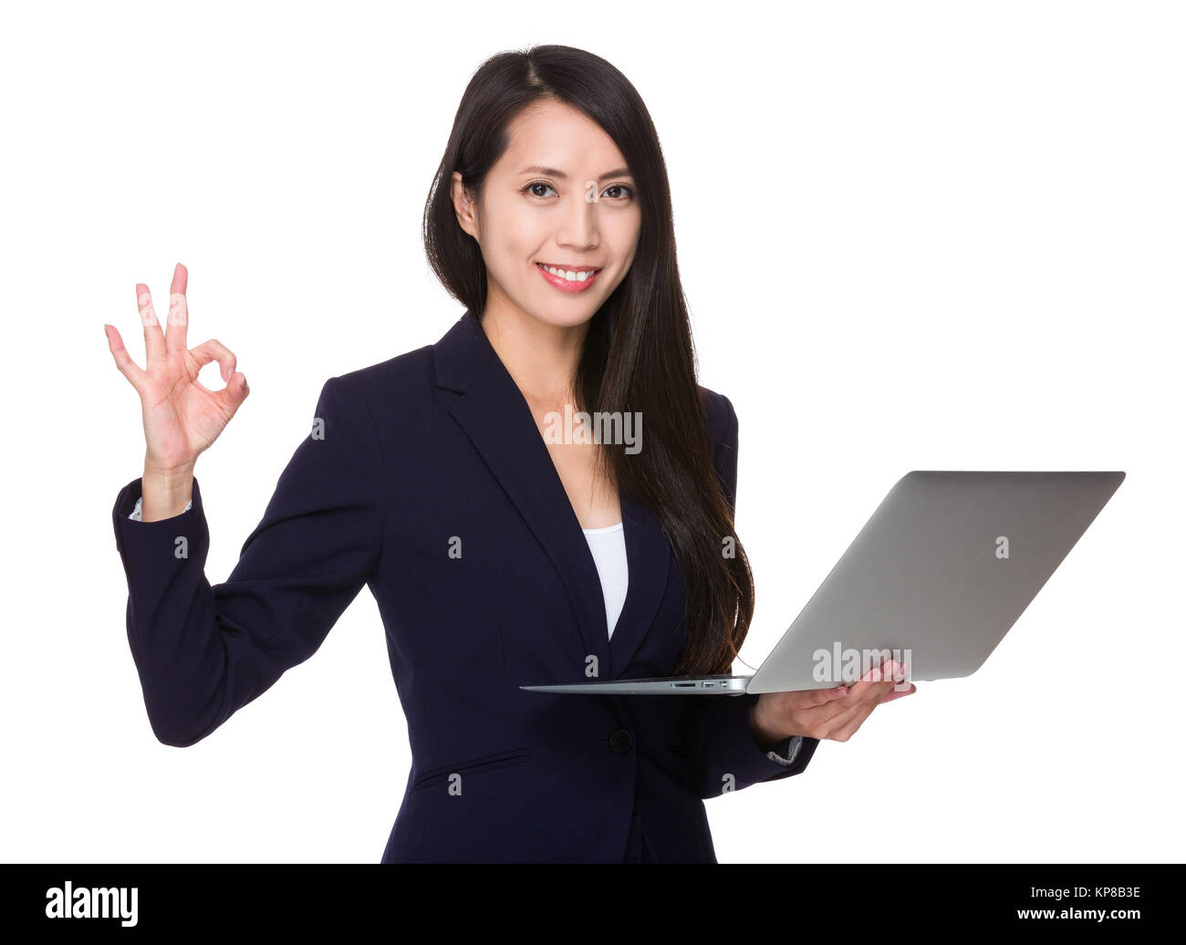 Young Businesswoman hold with notebook computer and ok sign gesture Stock Photo - Alamy