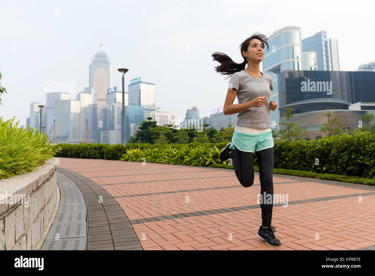 Woman jogging at outdoor Stock Photo - Alamy