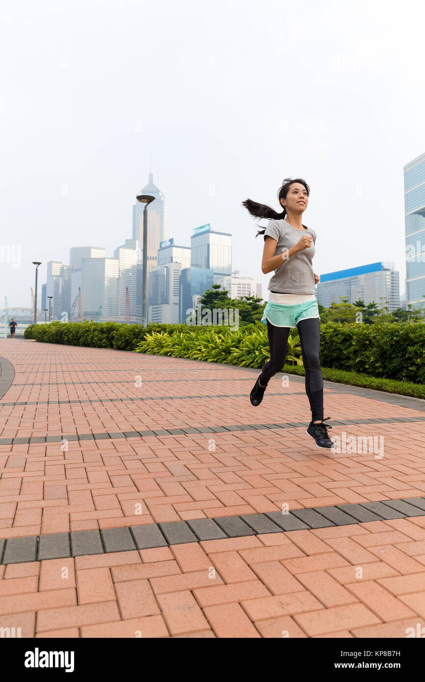 Asian Woman jogging at outdoor Stock Photo - Alamy