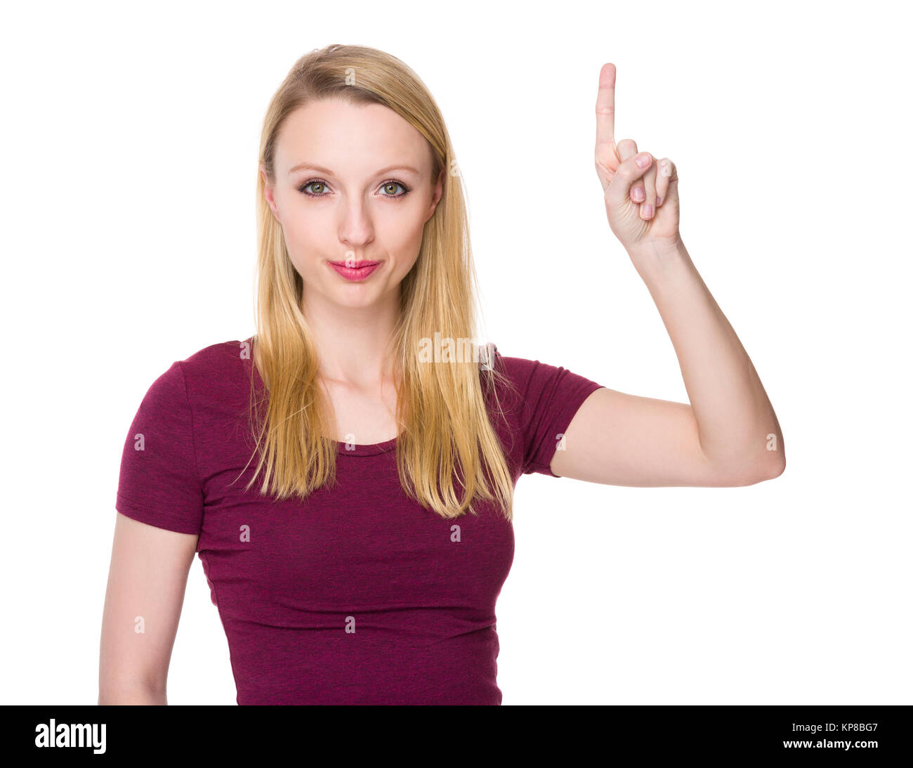 Caucasian young woman holding finger up Stock Photo - Alamy