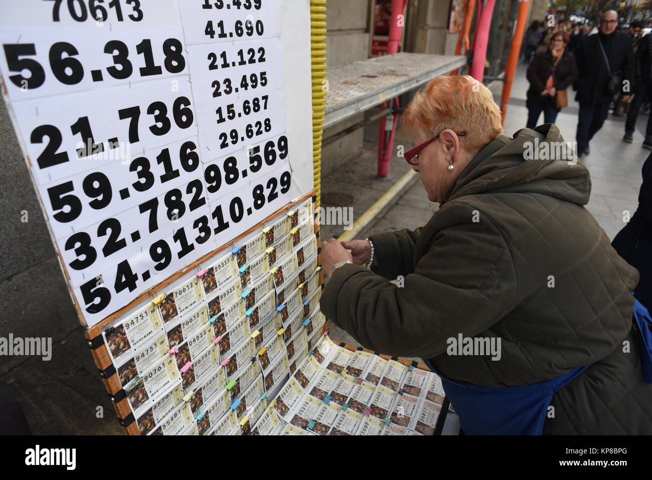 Madrid, Spain. 13th Dec, 2017. A vendor of 'El Gordo' lottery tickets ...