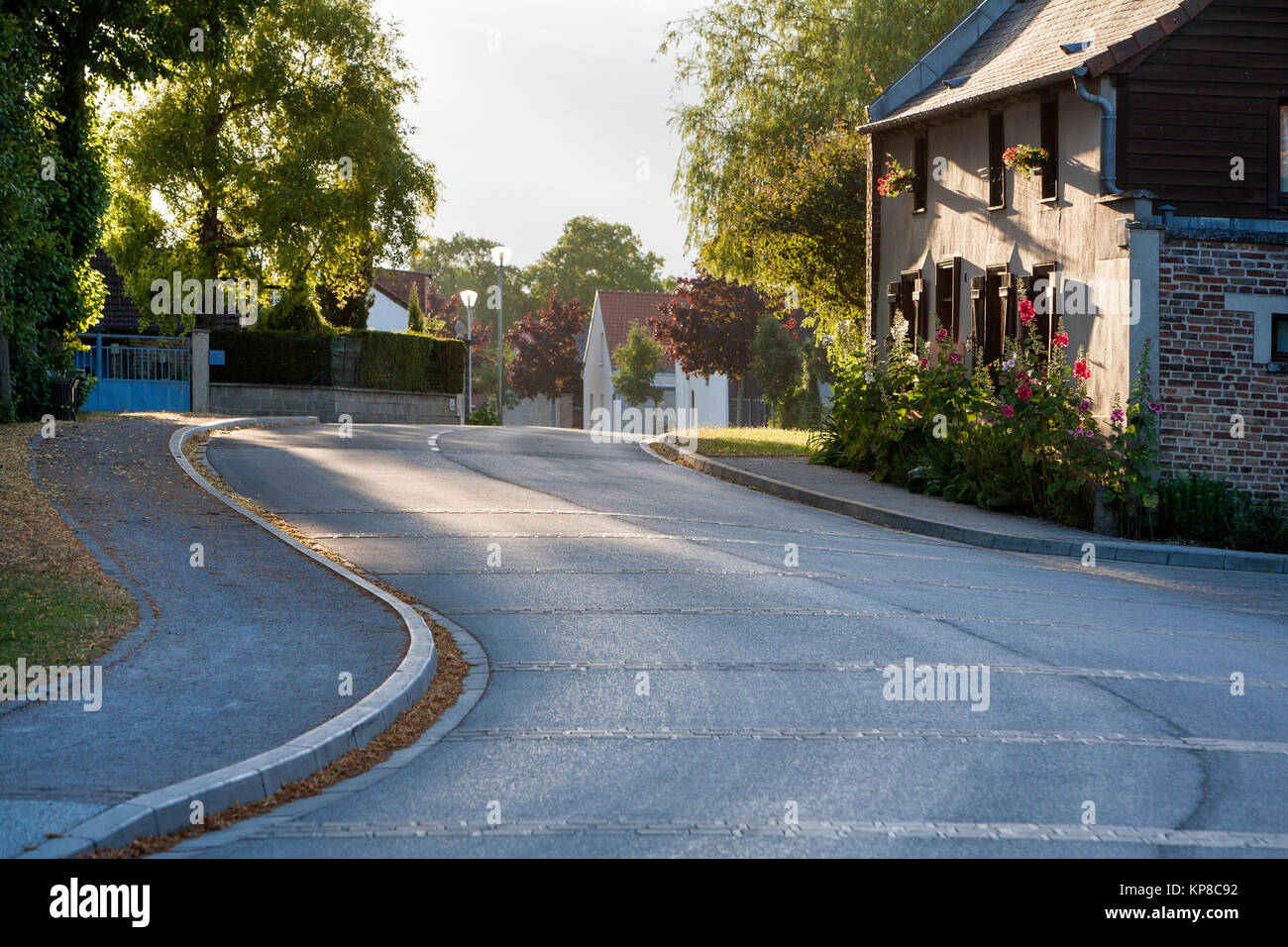 Asphalt village street Stock Photo - Alamy