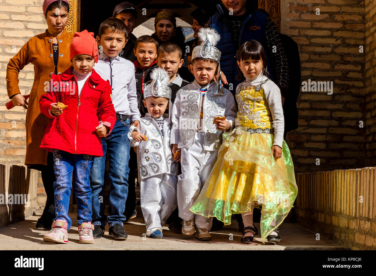 Uzbek Children Dressed In Traditional Costume Visit The Pahlavan Mahmud ...