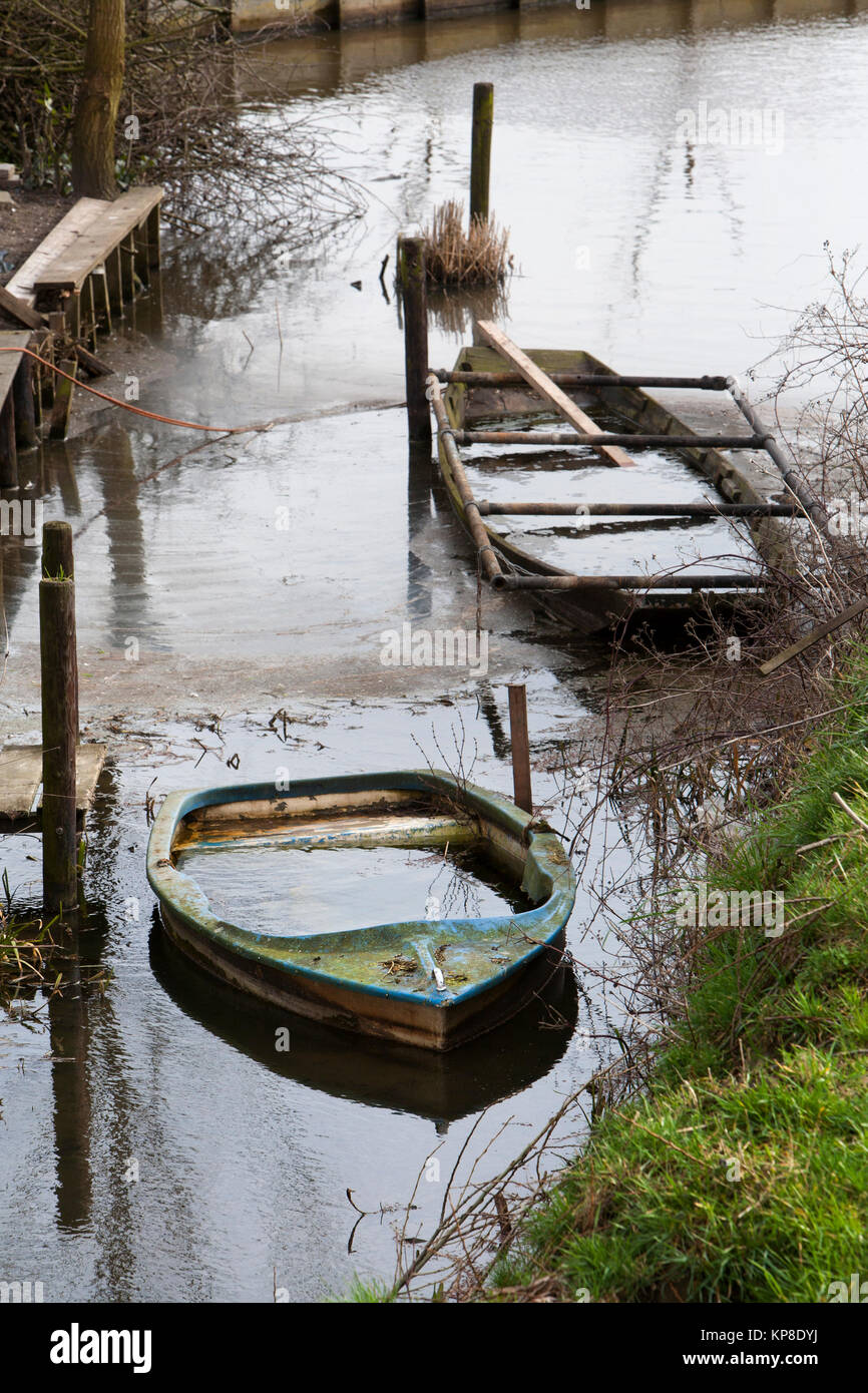 Small boat sinking hi-res stock photography and images - Alamy