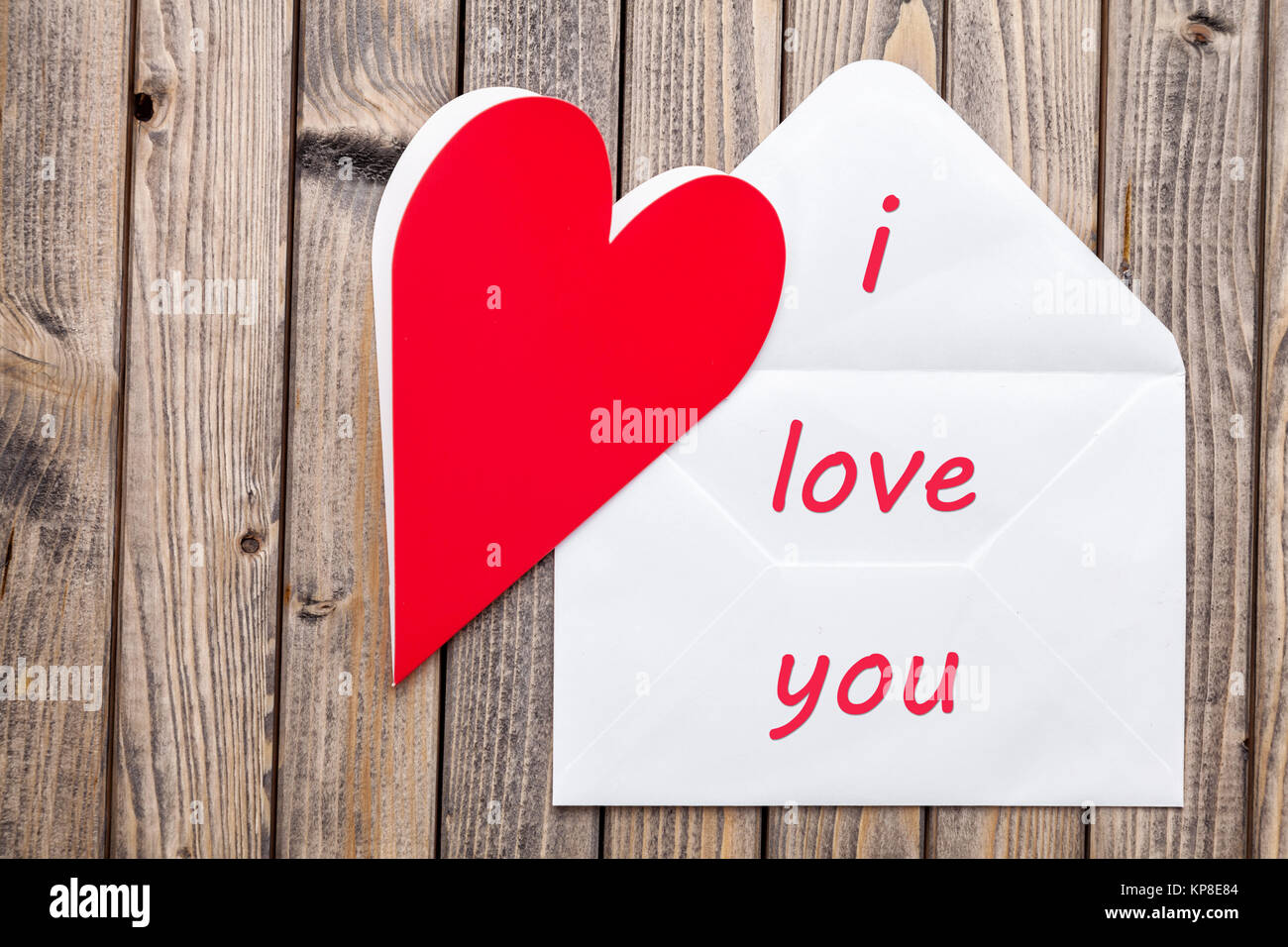 Love letter on a wooden background Stock Photo - Alamy