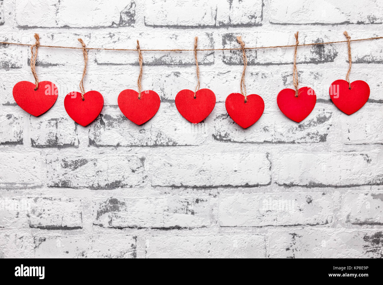 Love concept. Hearts on a string Stock Photo - Alamy