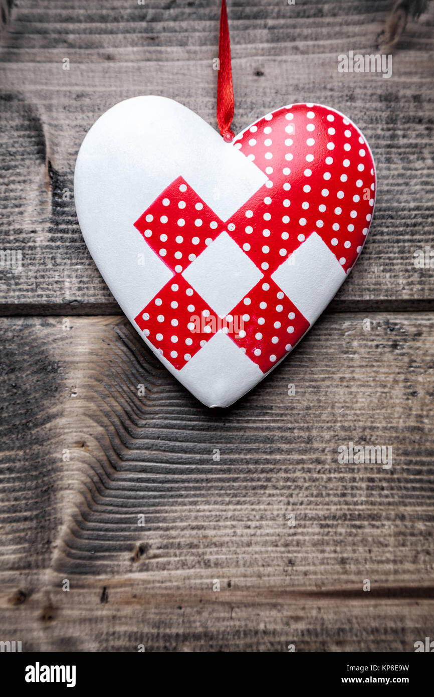 Love concept. Heart hanging on a string Stock Photo - Alamy