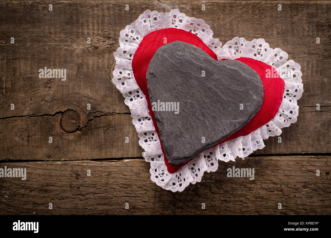 Heart shape of dark slate Stock Photo - Alamy