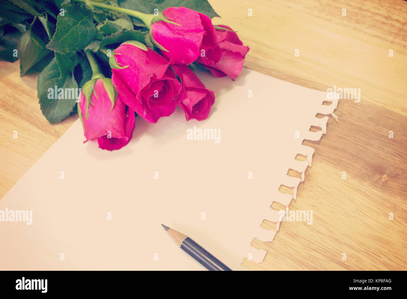 Vintage,retro of note book paper and pencil with rose Stock Photo - Alamy