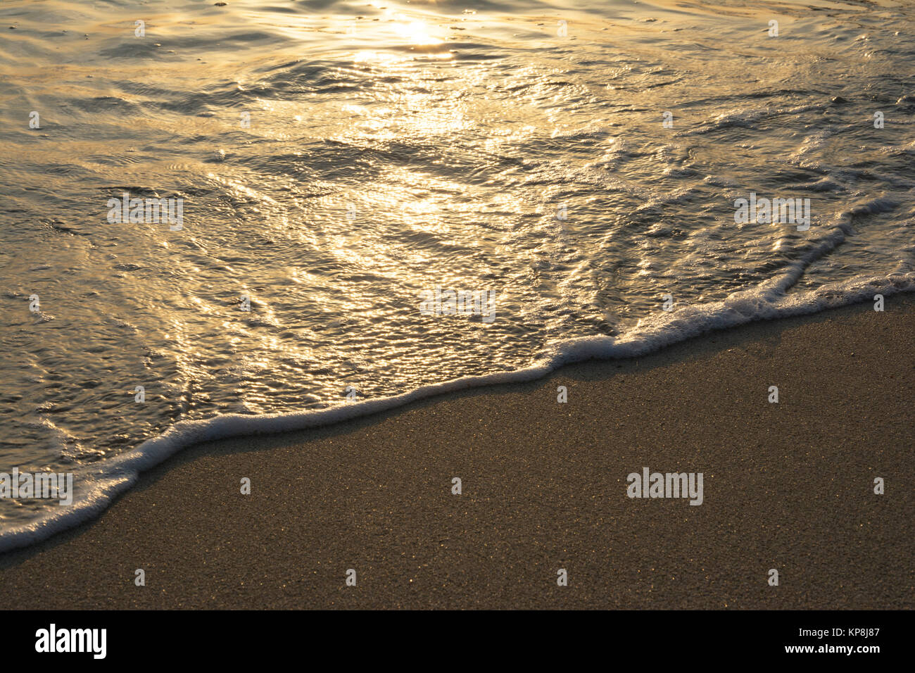 Tropical Beach Waves At Golden Hour Stock Photo - Alamy