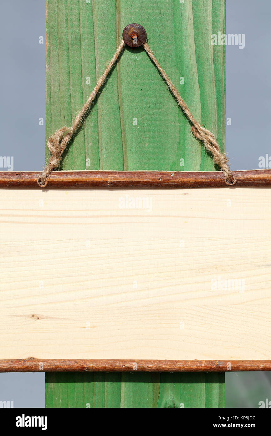 empty wooden sign hanging on a rope Stock Photo - Alamy