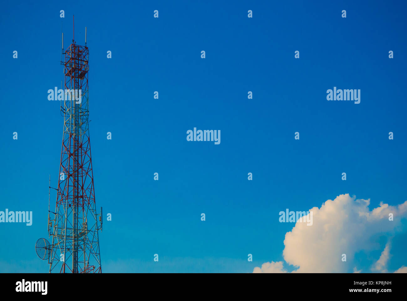 Telecommunication Tower with Blue Sky Stock Photo - Alamy
