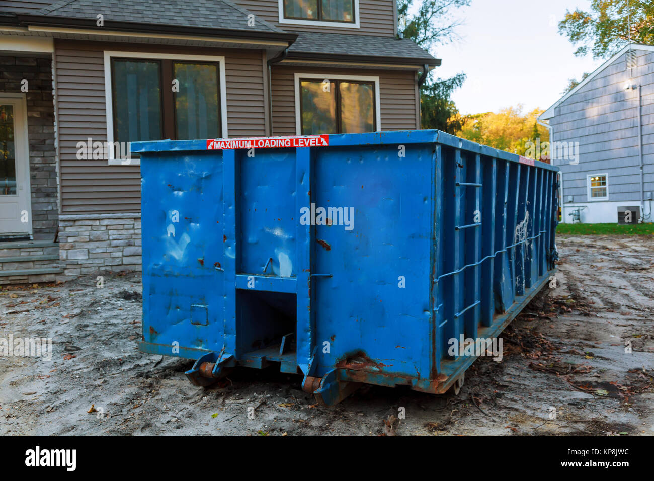 Dumpsters being full with garbage in a city. Dumpsters being full with ...