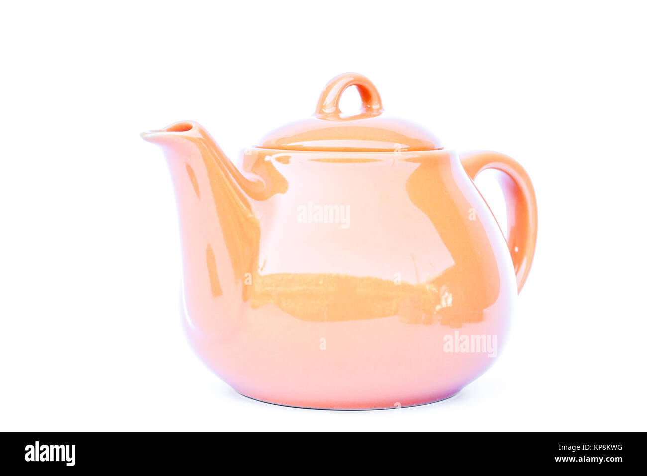 Orange ceramic teapot isolated on white background Stock Photo - Alamy