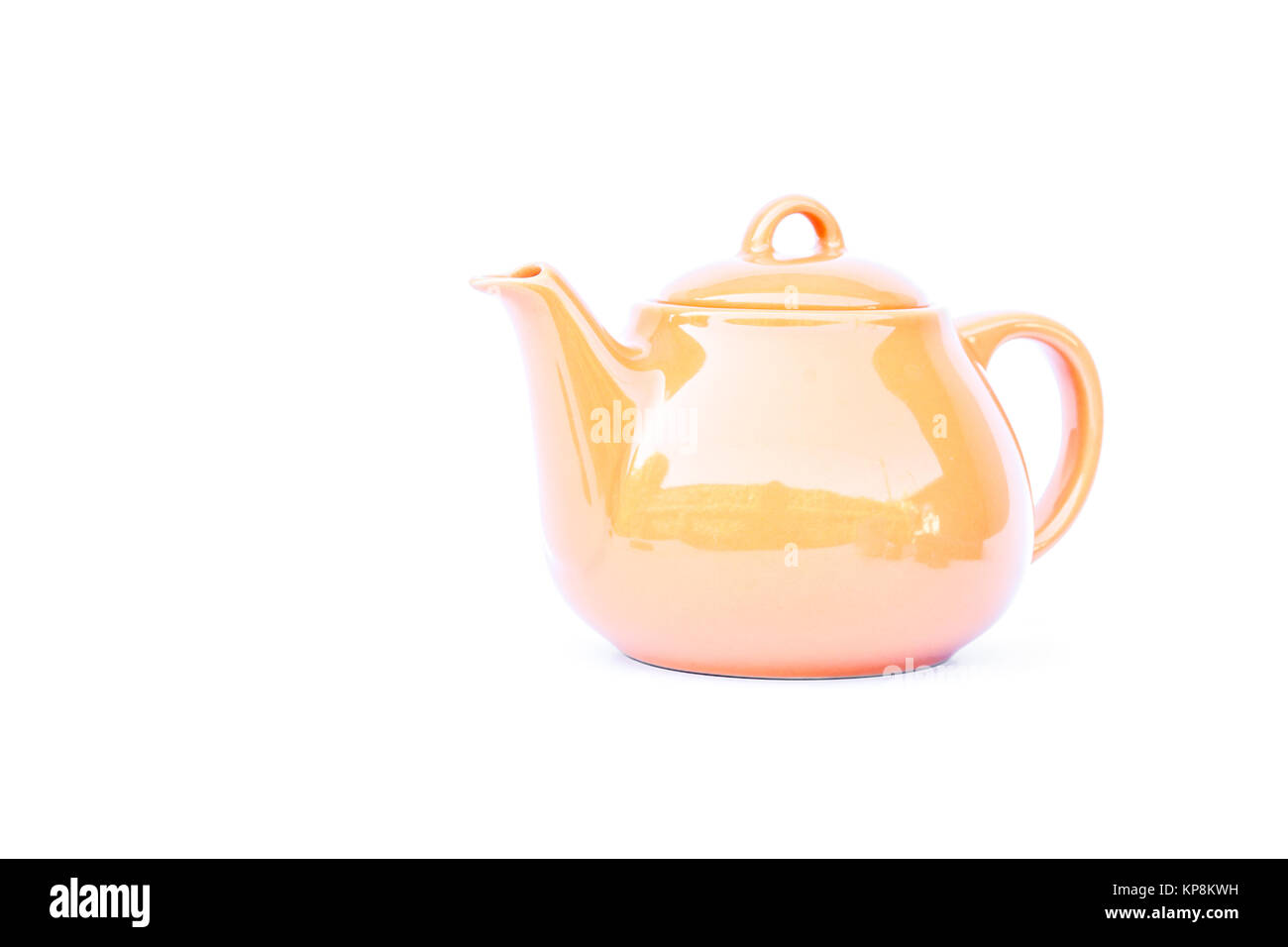 Orange ceramic teapot isolated on white background Stock Photo - Alamy
