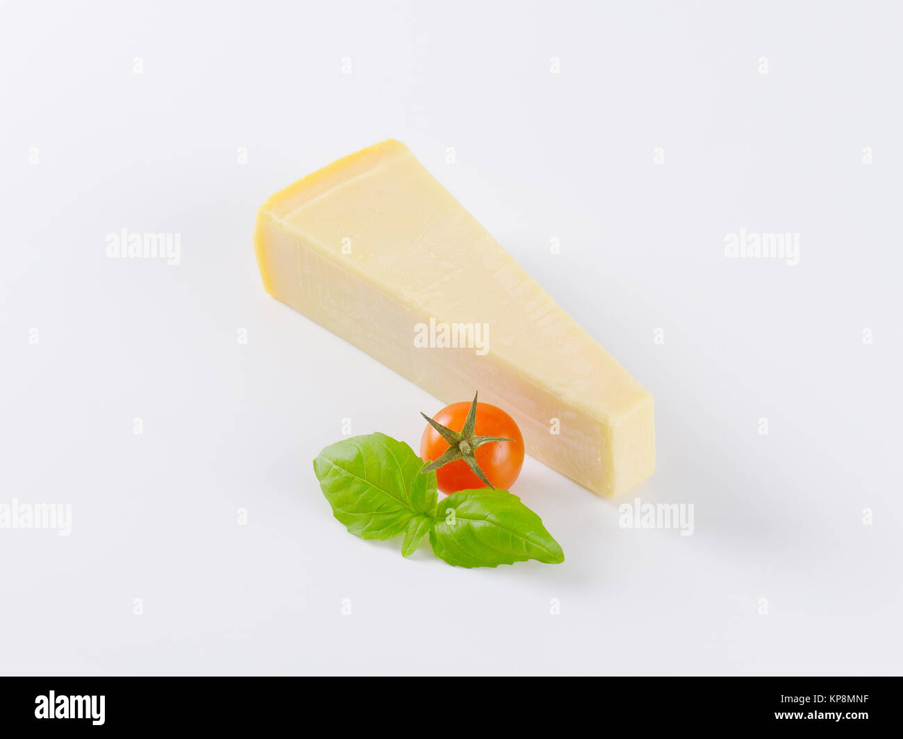 parmesan cheese wedge Stock Photo - Alamy