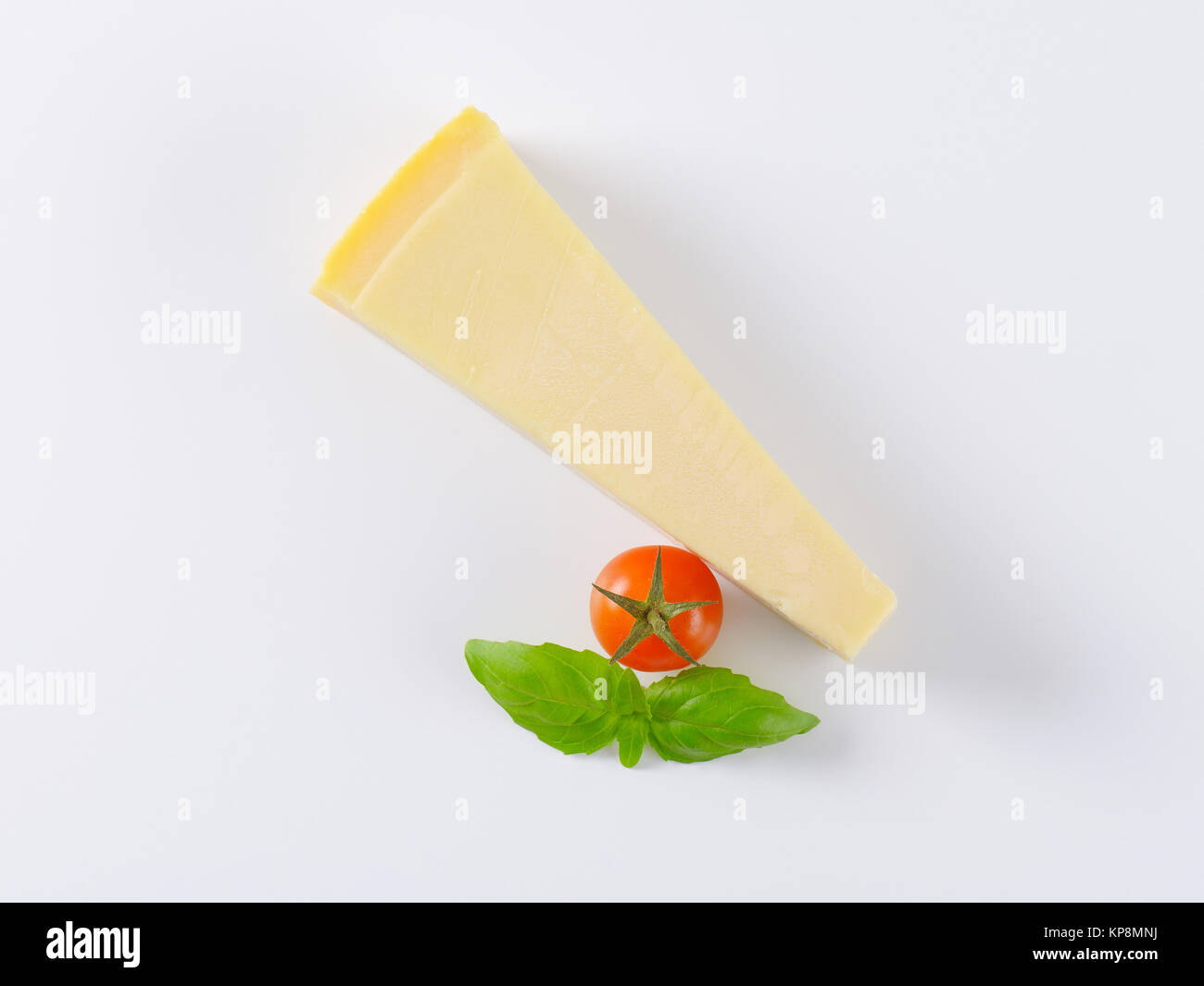 parmesan cheese wedge Stock Photo - Alamy