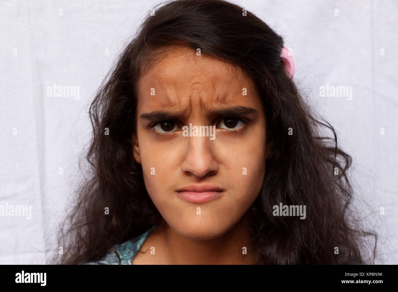 Portrait of a angry girl child Stock Photo - Alamy
