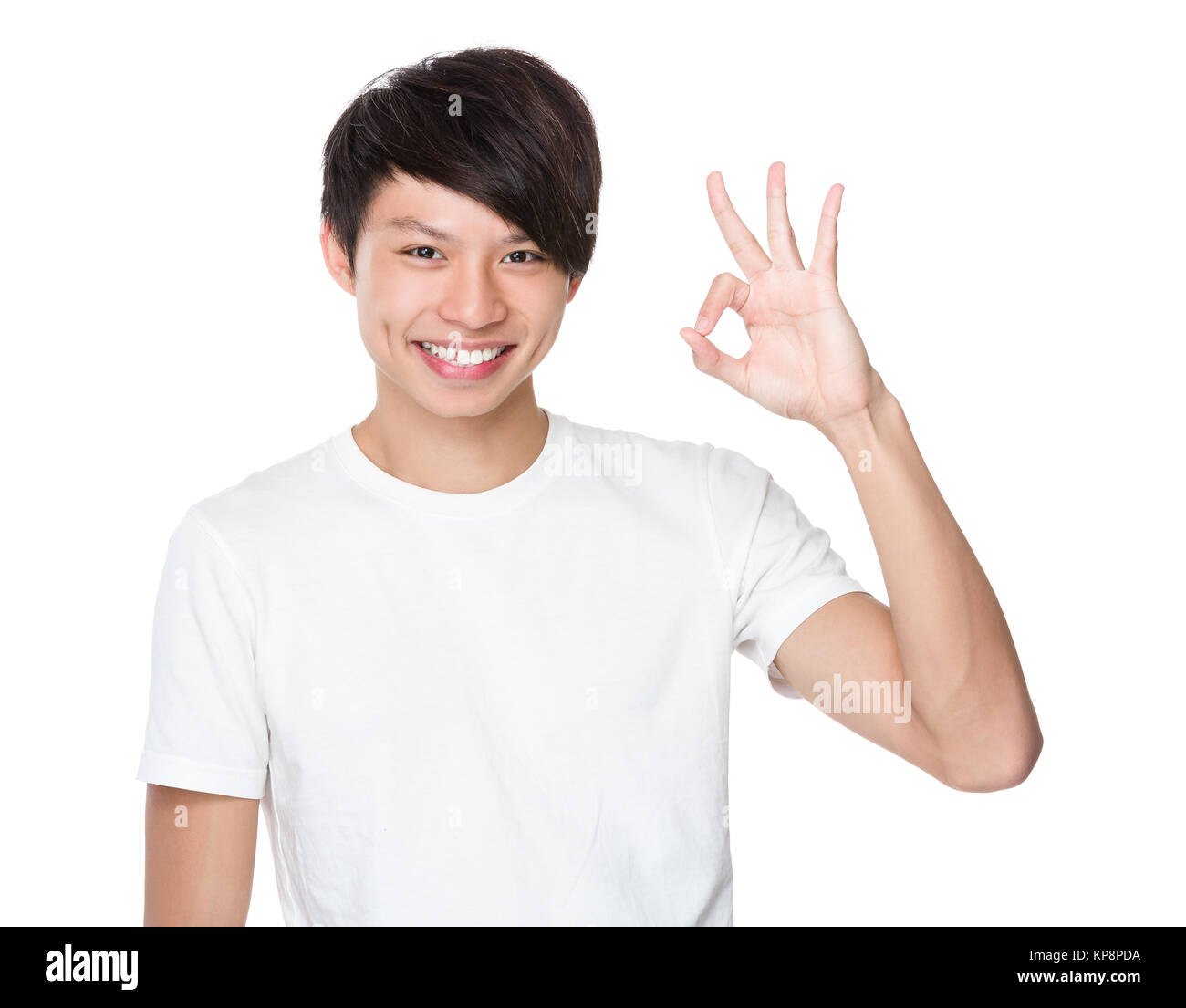 Asian young man with ok sign gesture Stock Photo - Alamy