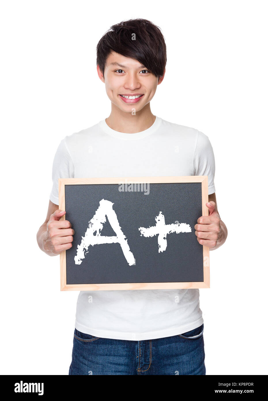 Young man hold with chalkboard showing A plus mark Stock Photo - Alamy