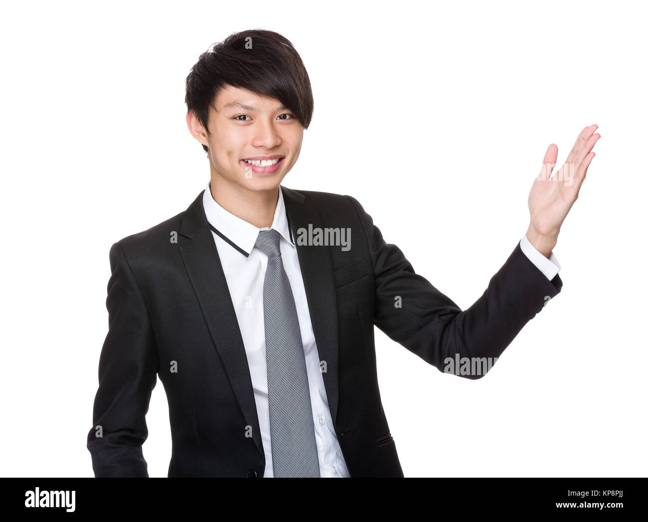 Businessman showing hand presentation Stock Photo - Alamy