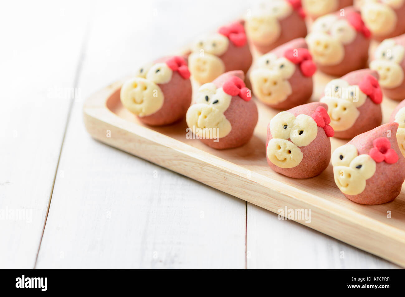 fancy cookie in wood plate and white wood background, creative bakery ...