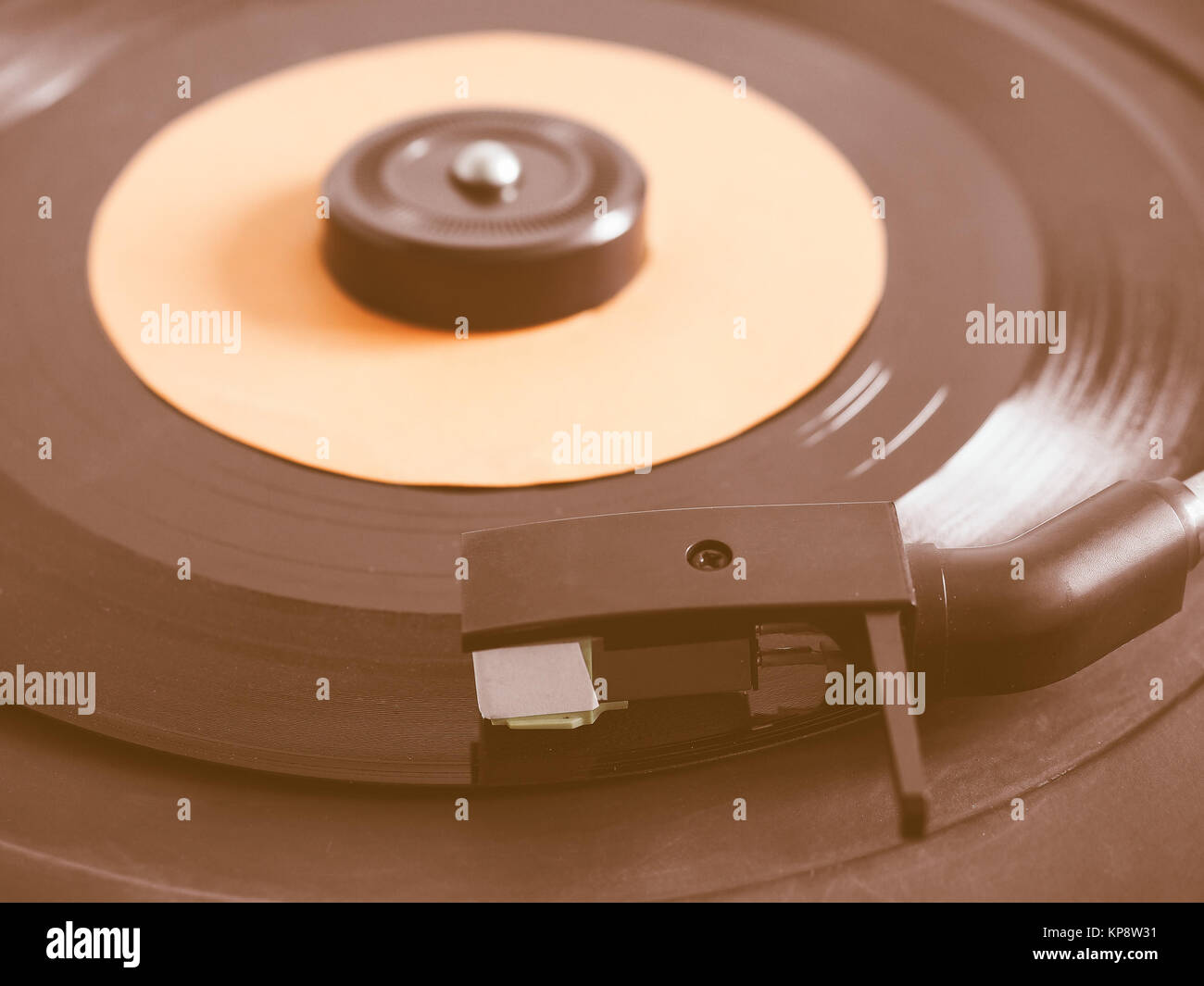 Vinyl record on a turntable record player, single 45rpm disc vintage ...