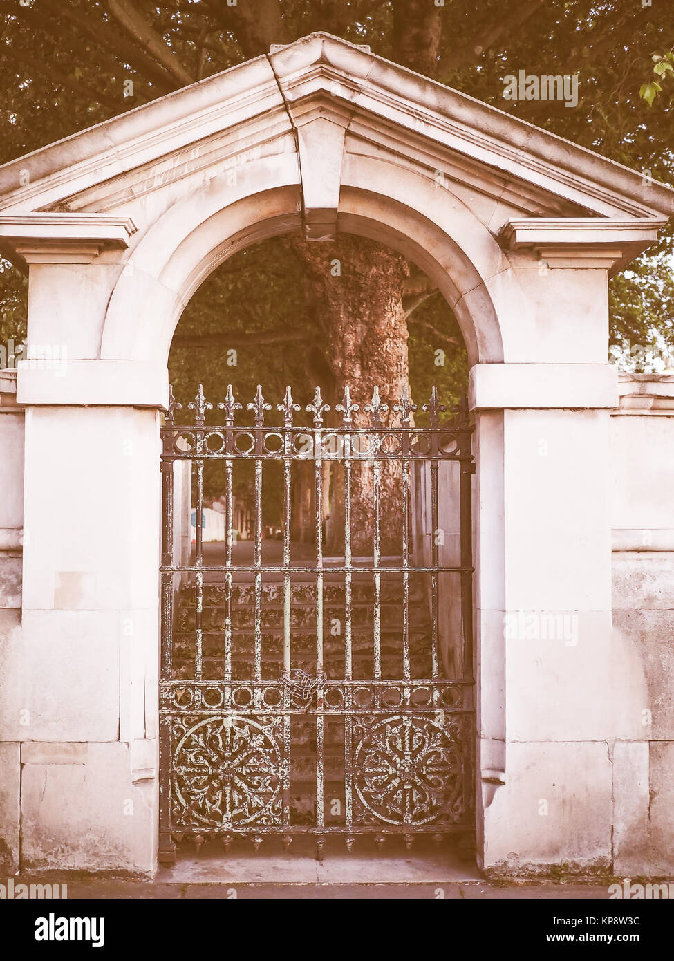Old iron gate under a marble arch vintage Stock Photo - Alamy