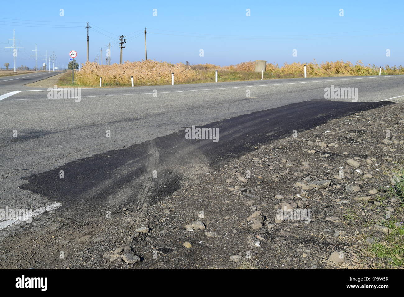 Repair of an asphalt road surfacing Stock Photo - Alamy