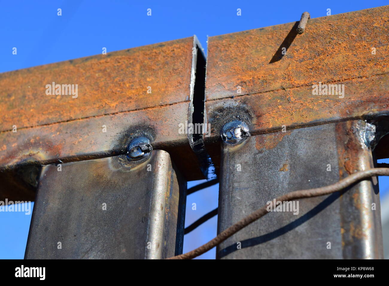 Connection by welding of metal square pipes Stock Photo - Alamy
