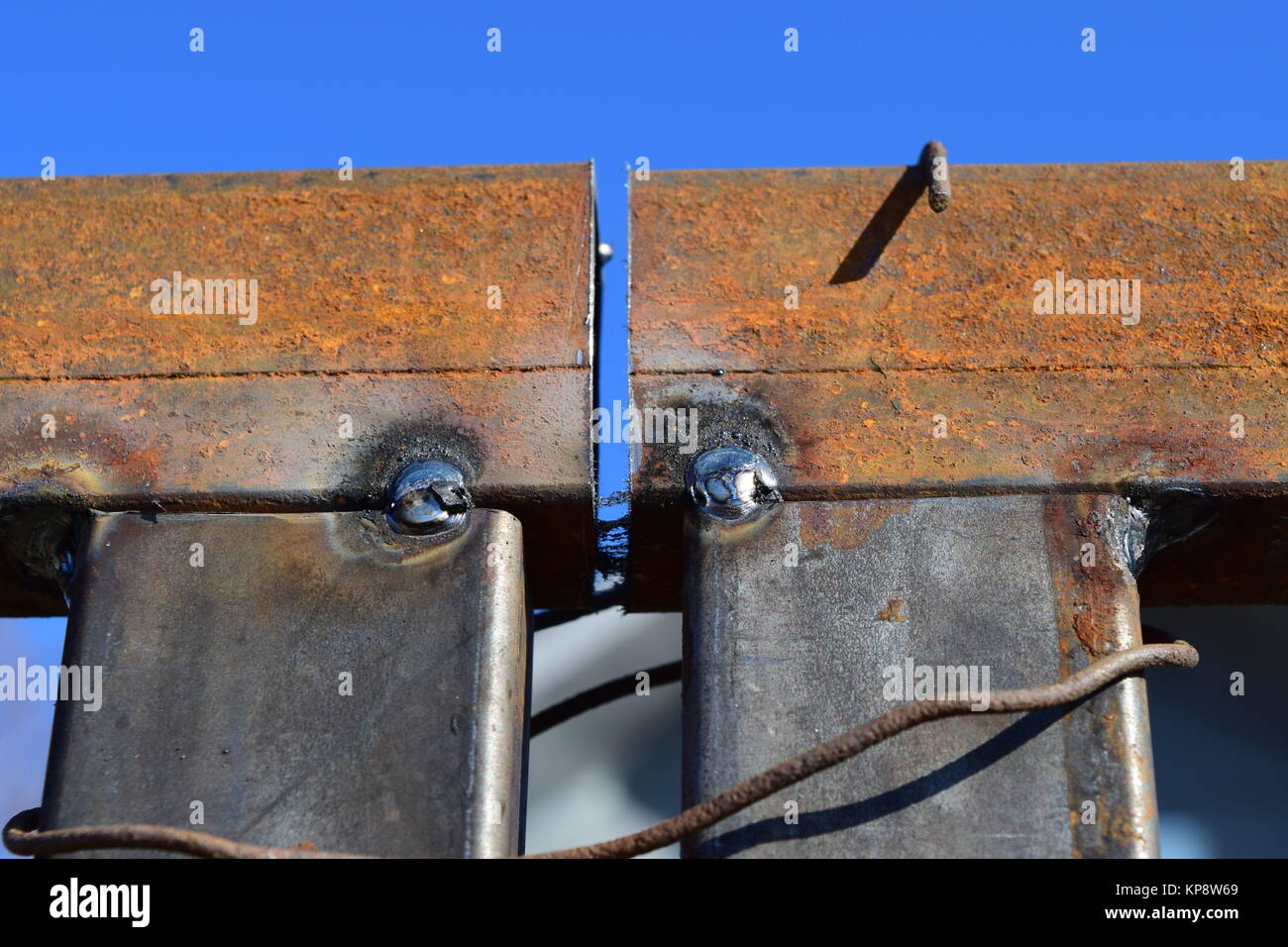 Connection by welding of metal square pipes Stock Photo - Alamy